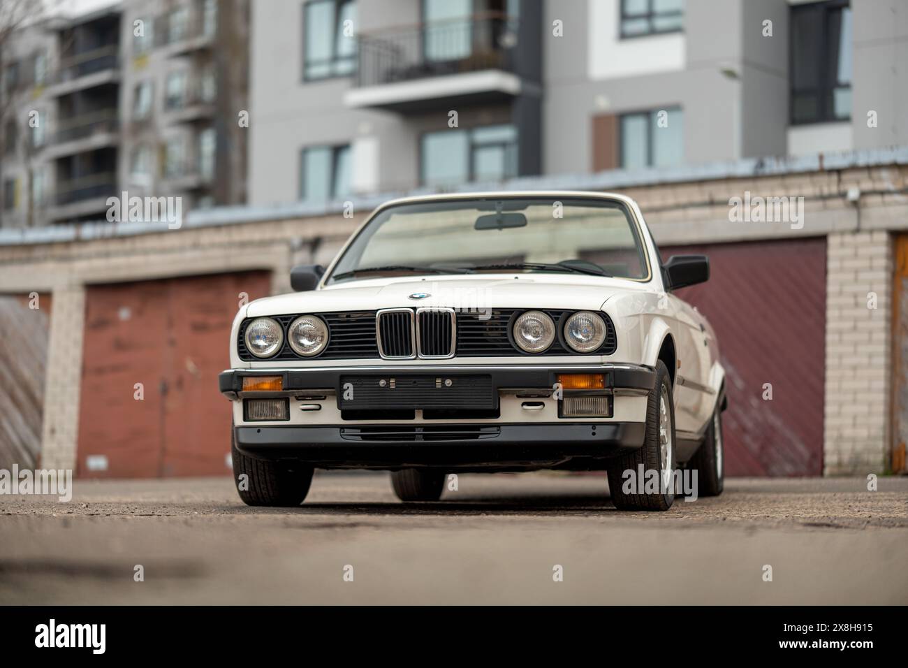 Riga, Latvia - April 1, 2024: The white classic convertible BMW E30 car ...