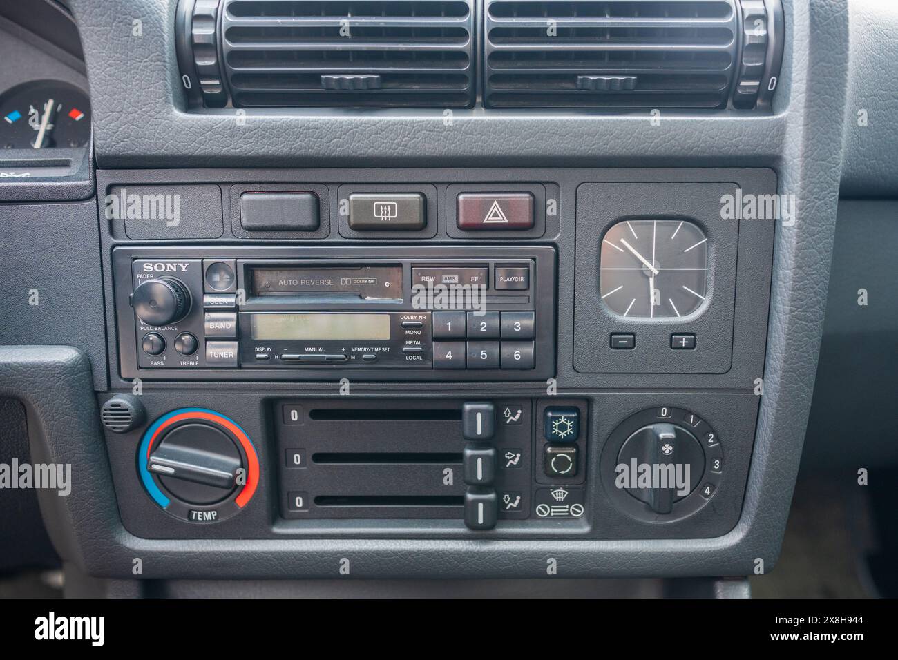 Riga, Latvia - April 1, 2024: Central side of dashboard of classic BMW ...