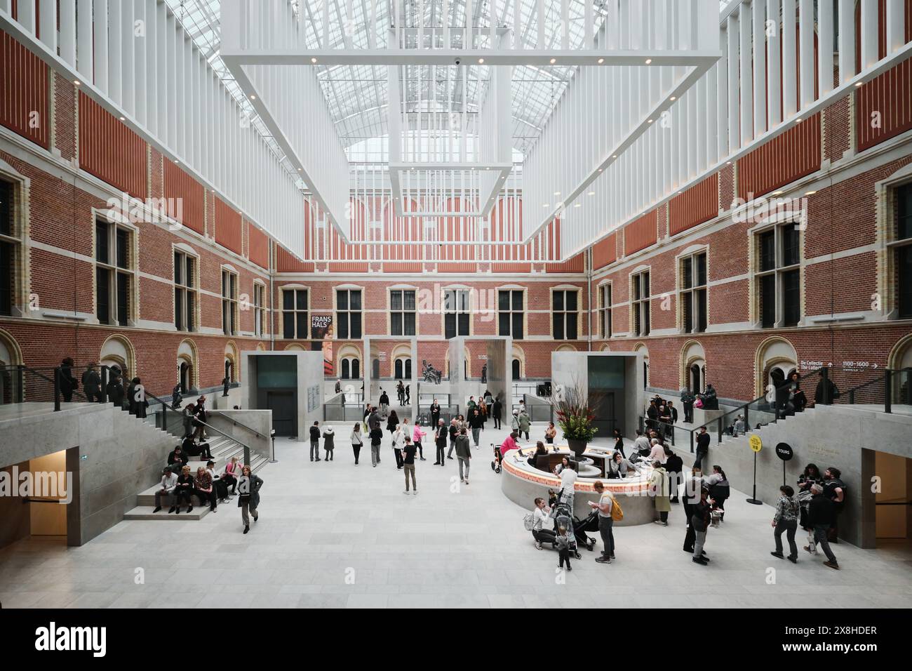 Netherlands, Amsterdam, Rijksmuseum, people in the original interior ...
