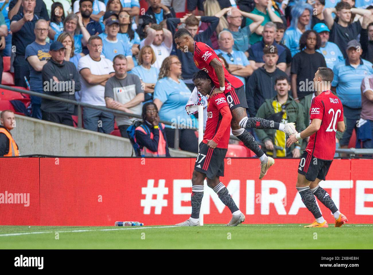 Kobbie Mainoo #37 of Manchester United celebrates his goal during the ...