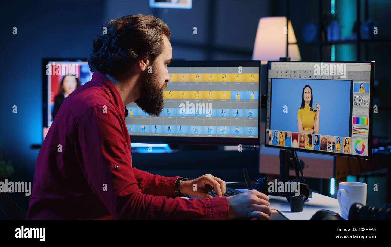 Photographer enhancing images quality, correcting flaws and adjust ...