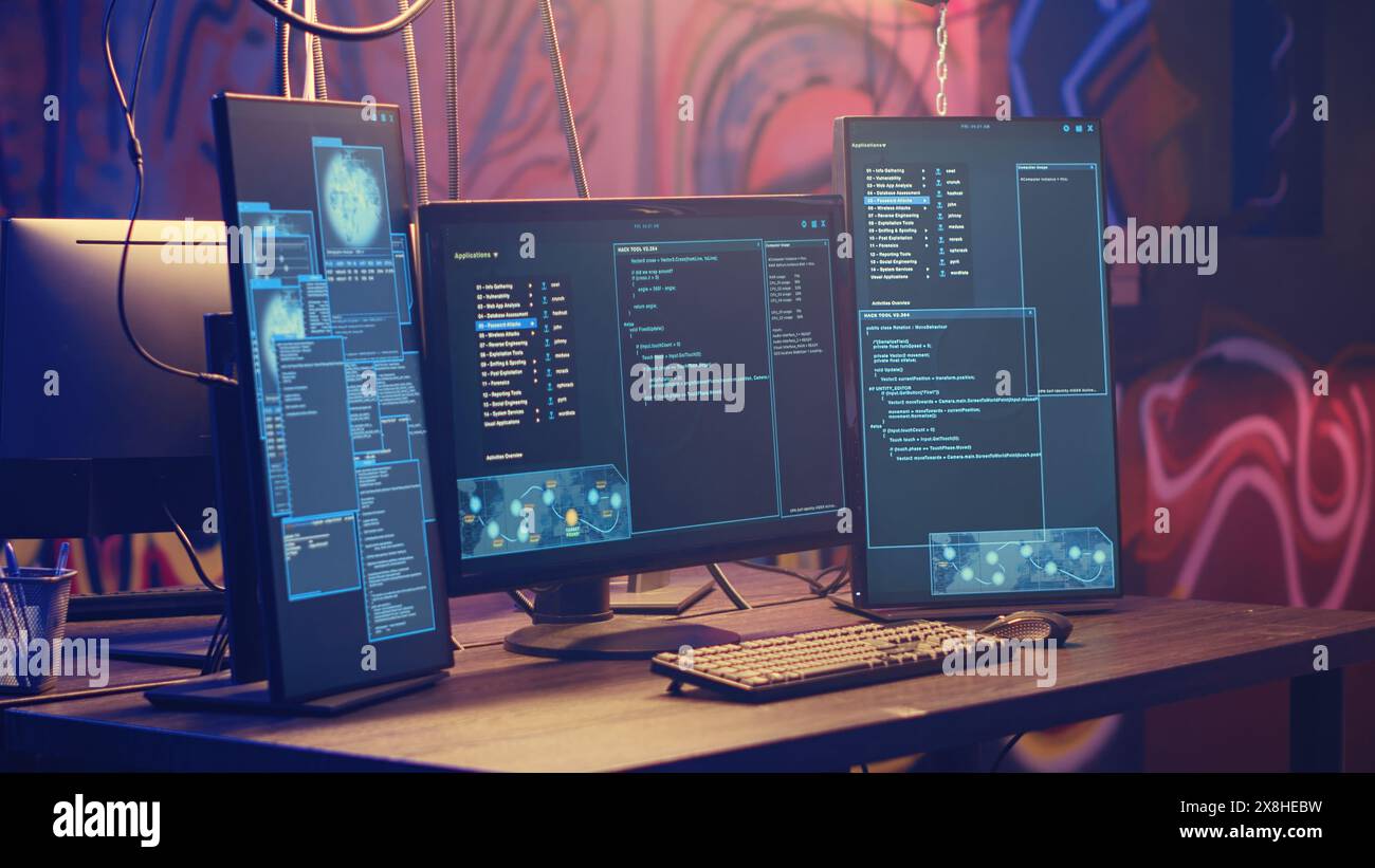 Close up shot on computer screens with hacking lines of code in hidden ...