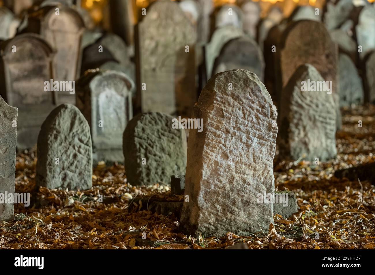 Tombstones in an old cemetery at night Stock Photo - Alamy