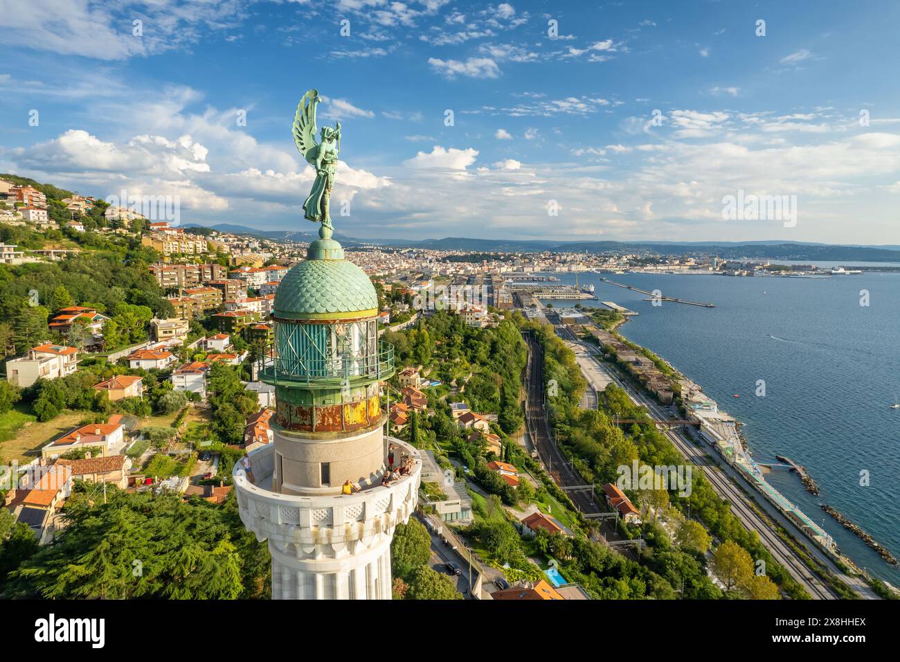 Faro della Vittoria lighthouse in Trieste city at sunny day, Italy ...