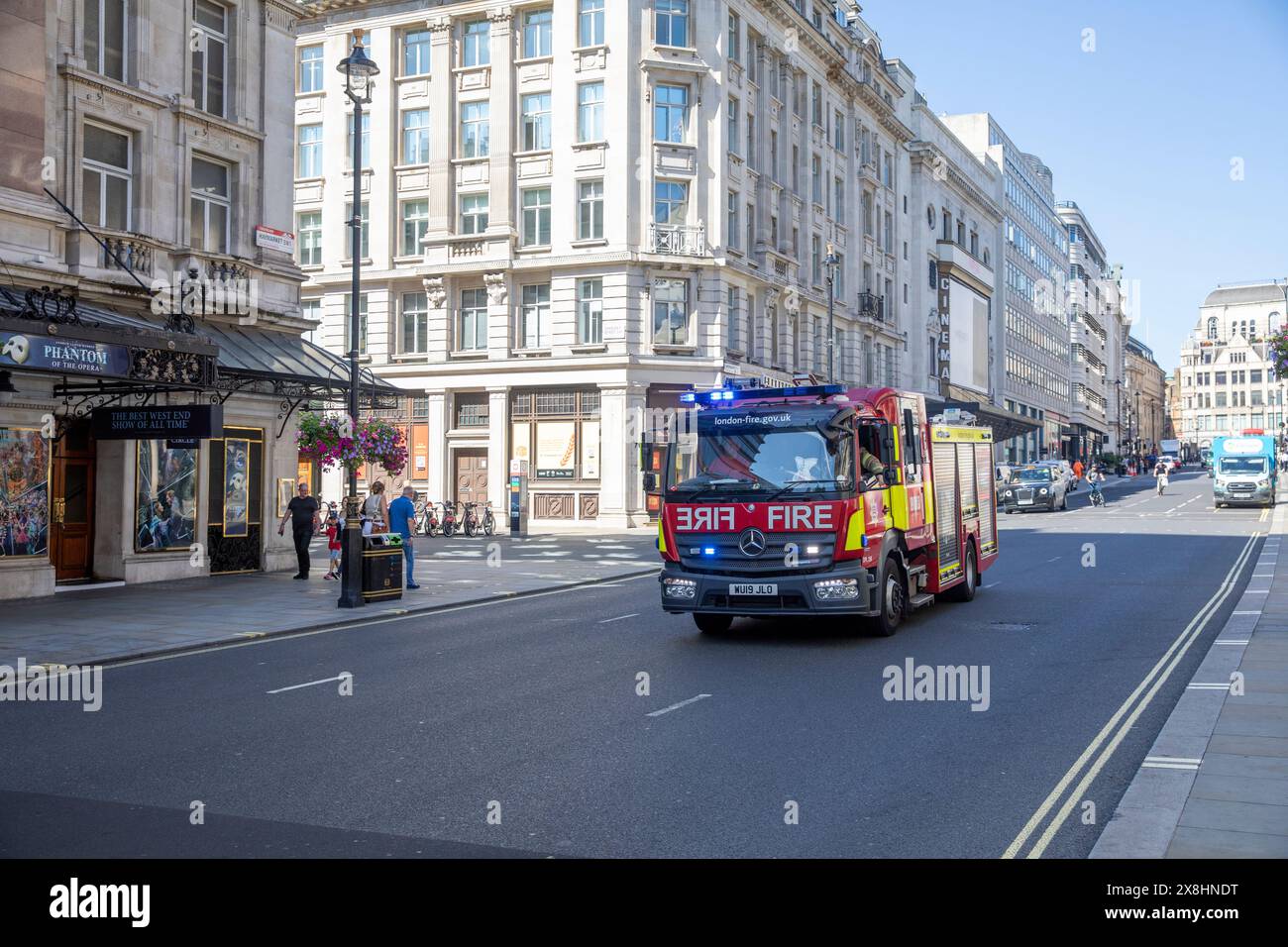 London West End, London Fire brigade truck responding to an emergency ...