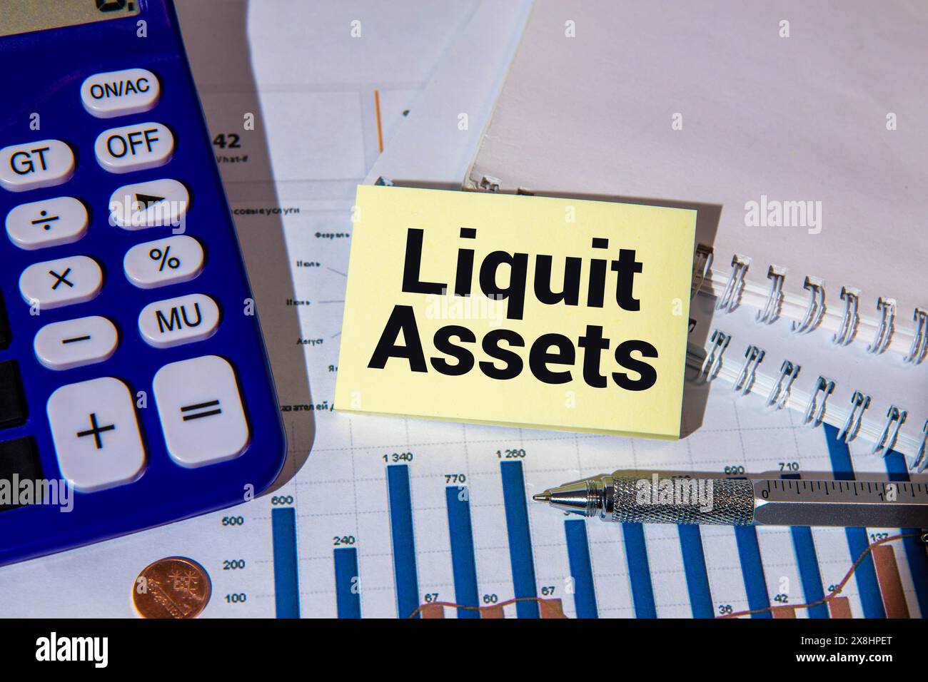 Liquid Assets. text on notepad on white background Stock Photo - Alamy