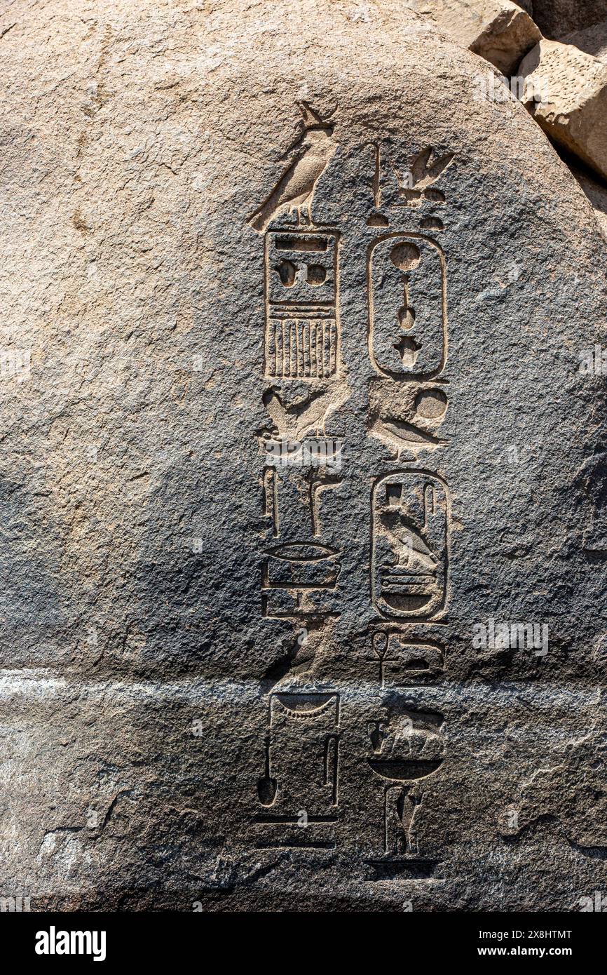 The cartouche of Egyptian pharaoh Psamtik II on a massive boulder next ...