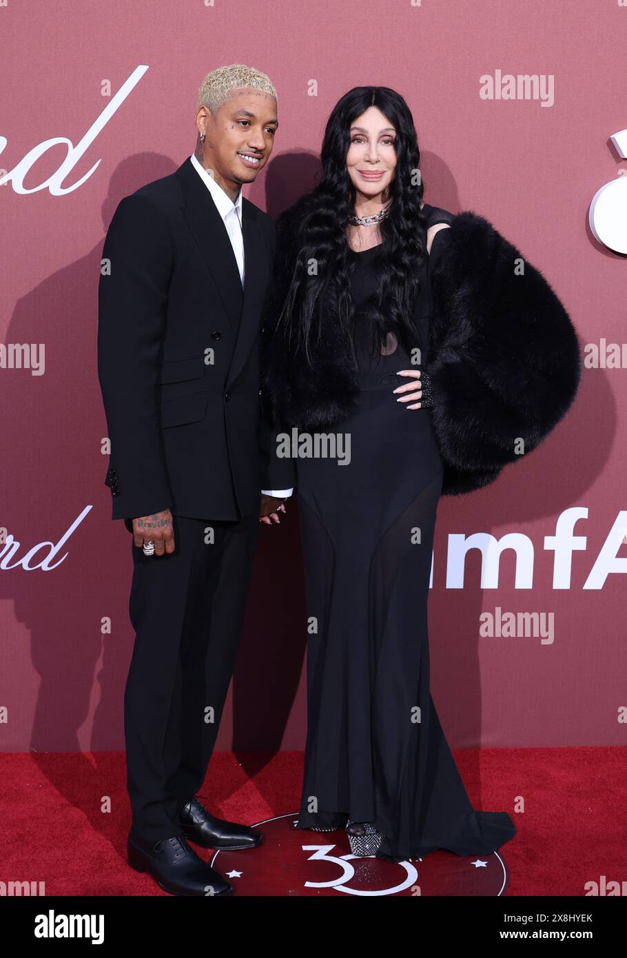 Alexander Edwards and Cher attends the amfAR Cannes Gala 30th edition ...