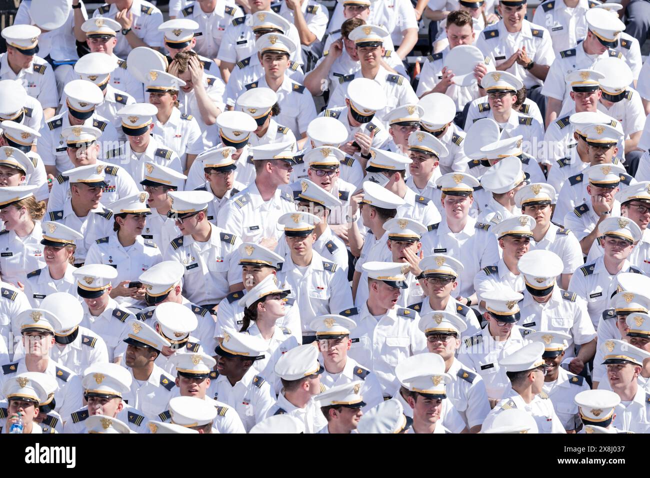 Underclassmen attend and cheer for graduates during U.S. Military ...