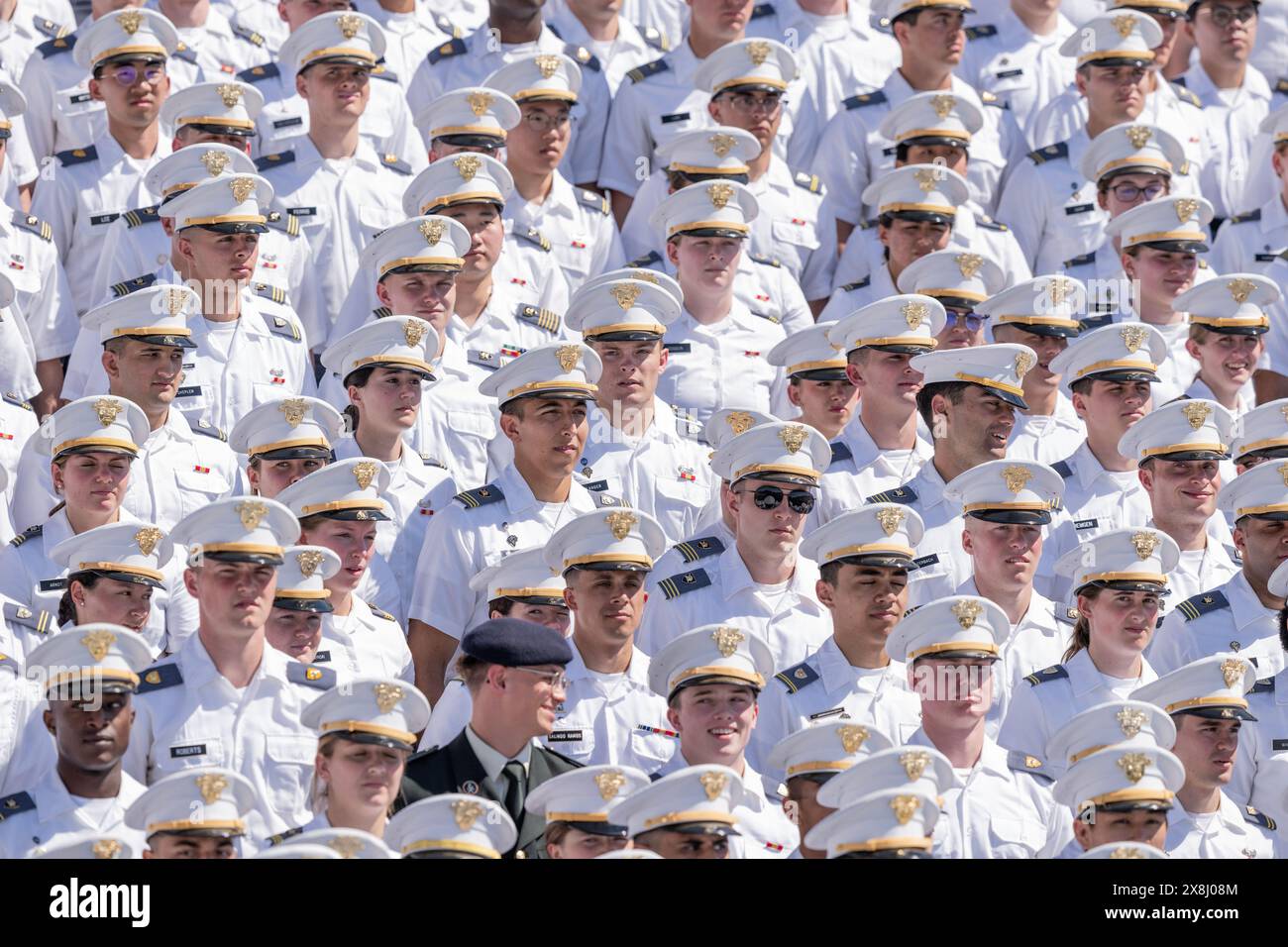 Underclassmen attend and cheer for graduates during U.S. Military ...
