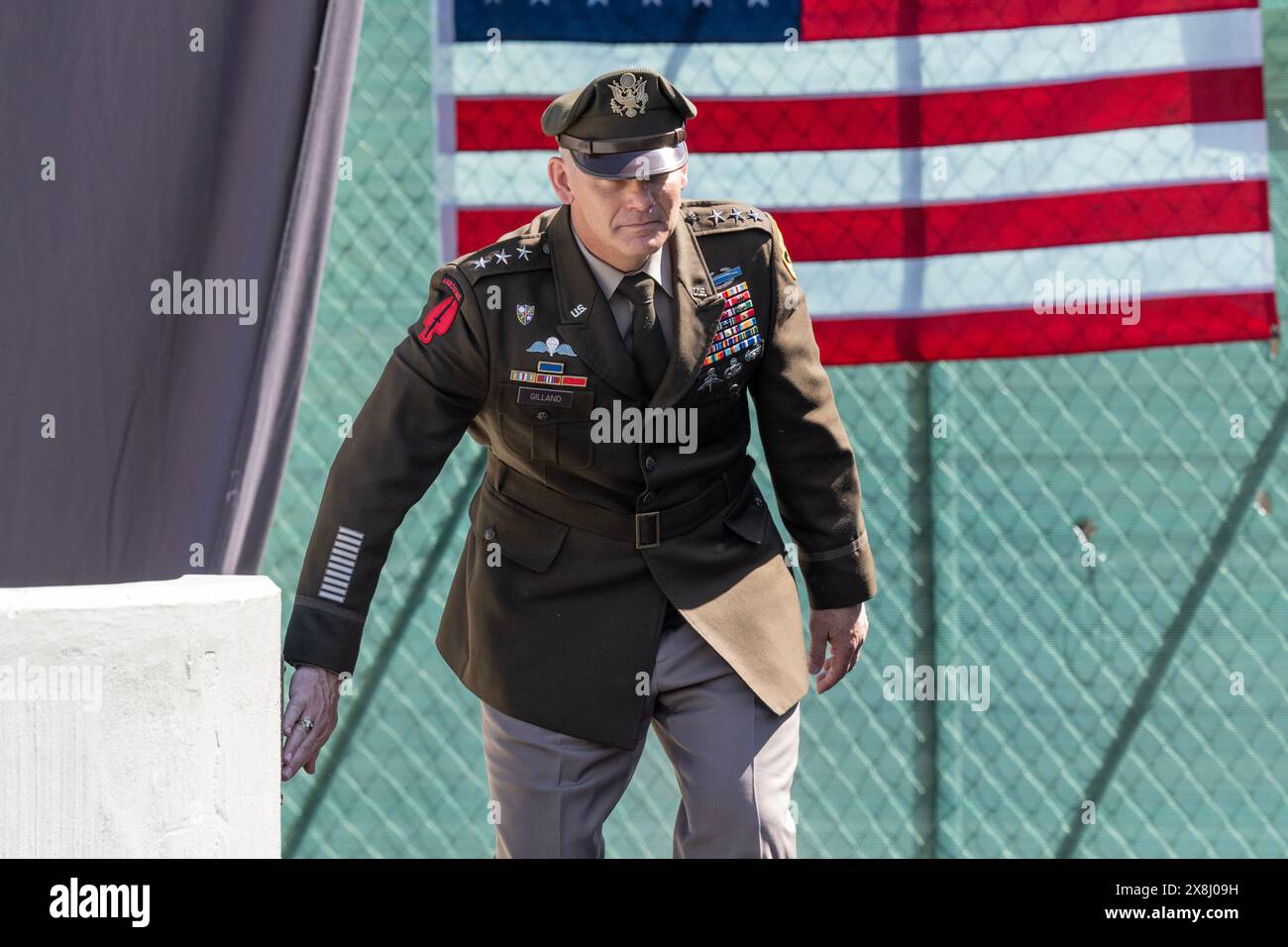 General Steven Gilland touching the Marshall Plaque before entering for ...