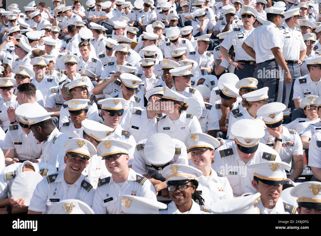 Underclassmen attend and cheer for graduates during U.S. Military ...