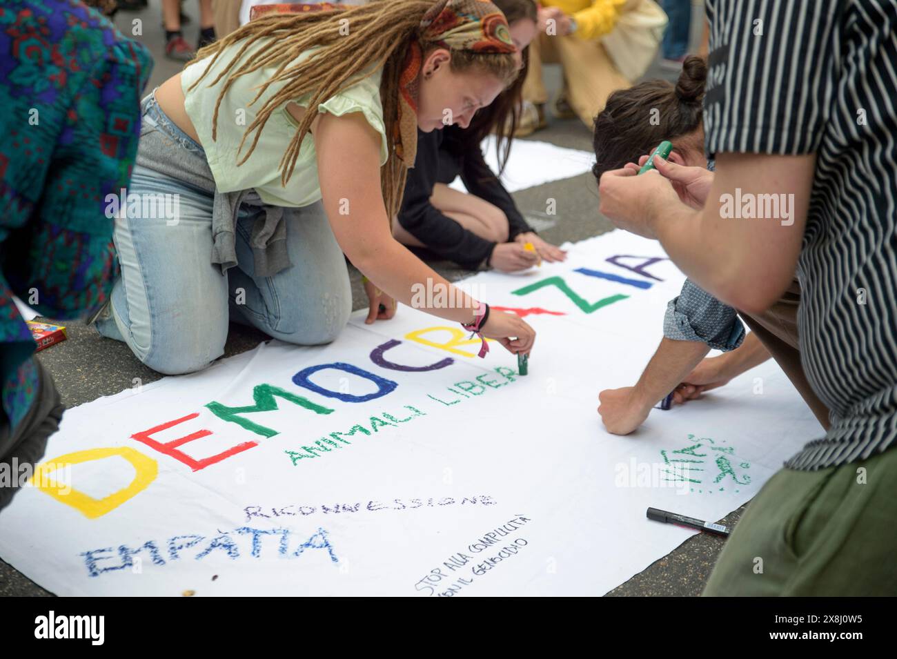 May 25, 2024, Rome, Italy: Environmental activists write words and ...