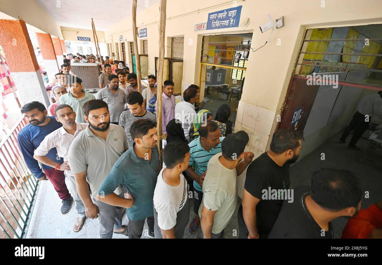 NEW DELHI, INDIA - MAY 25: People seen inside a polling booth to cast ...
