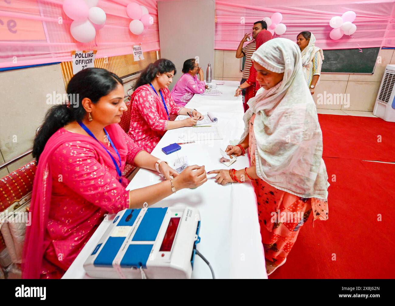 NEW DELHI, INDIA - MAY 25: Voters at a Pink polling station during the ...