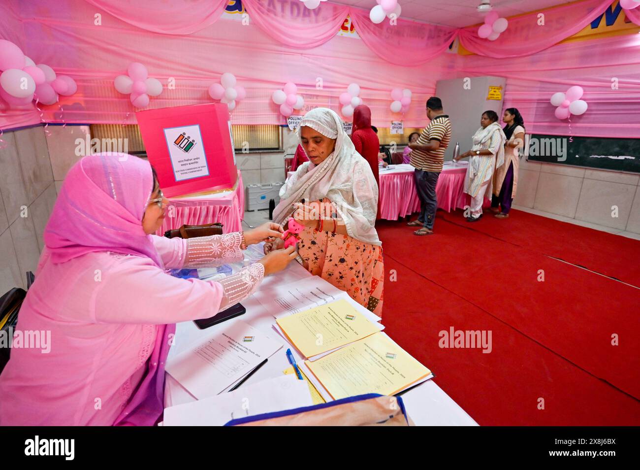 NEW DELHI, INDIA - MAY 25: Voters at a Pink polling station during the ...