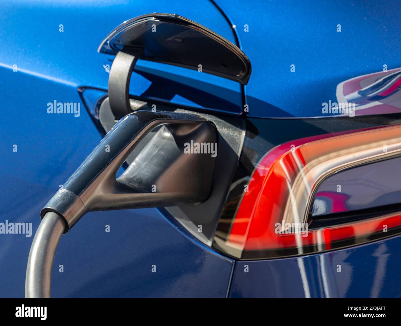 Blue Tesla charging at Tenterfield in northern NSW, number plate I ...