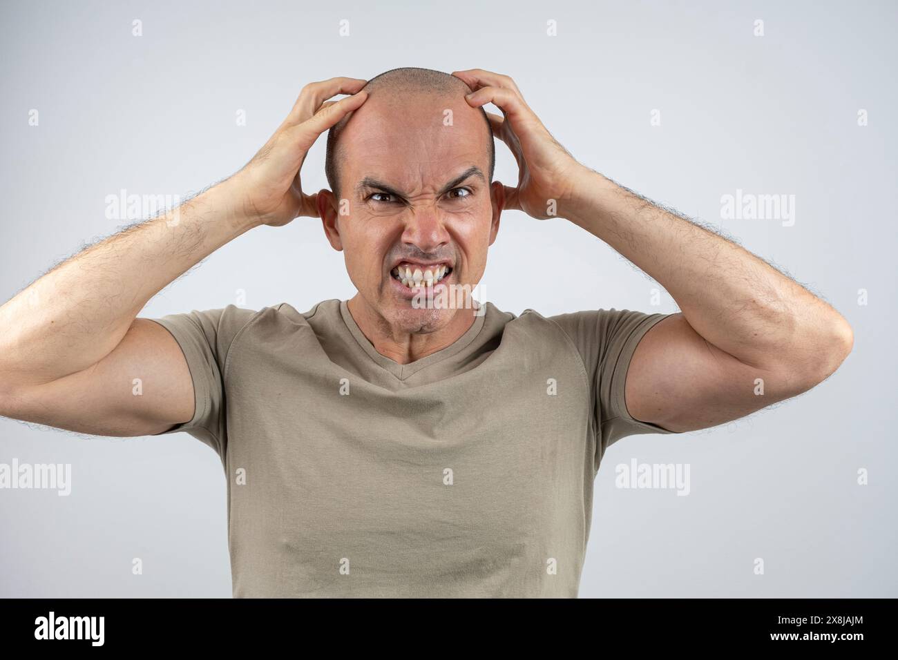 Angry bald man hi-res stock photography and images - Alamy