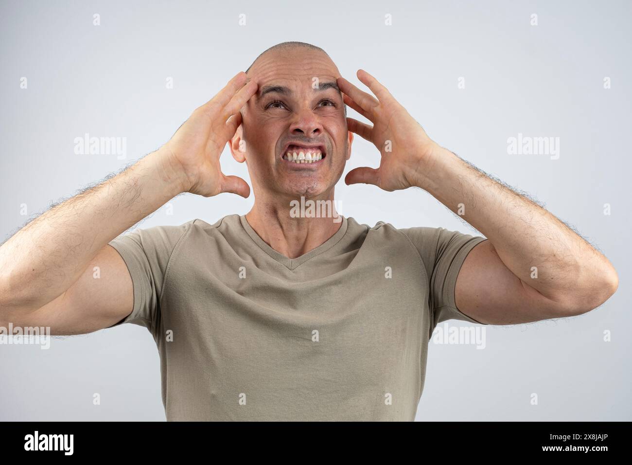 Caucasian, Brazilian man, 48 years old, in the studio showing emotions ...