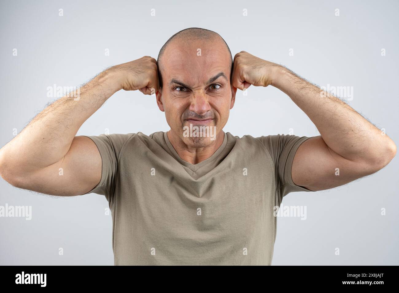 Caucasian, Brazilian man, 48 years old, in the studio showing emotions ...