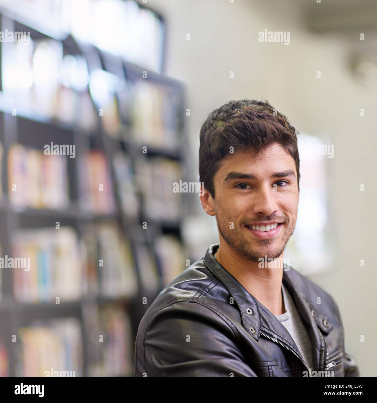 Man, student and portrait in library for education or learning, books ...