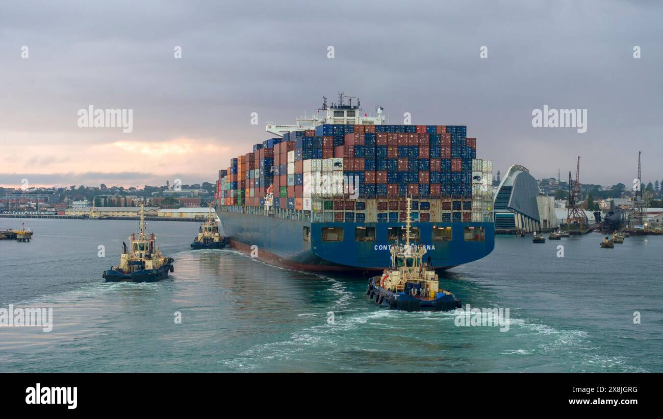 A container ship entering the Port of Fremantle, Western Australia ...