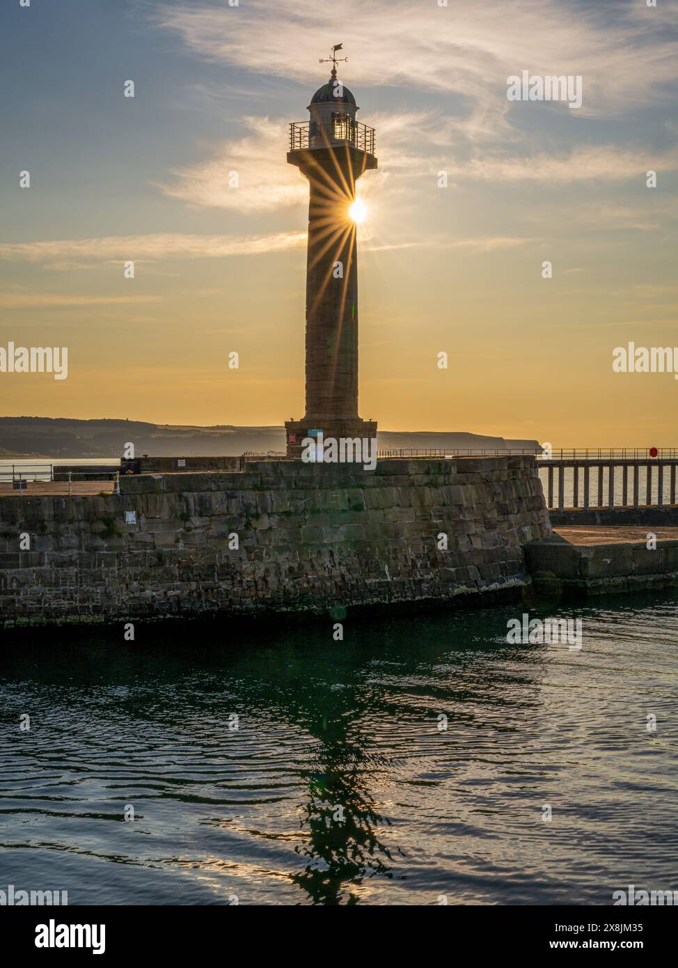 The West Pier Lighthouse in Whitby, North Yorkshire, England, UK Stock ...