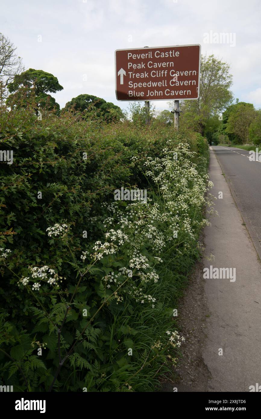 Road sign entering Castleton Hope Valley for attractions of Peveril ...