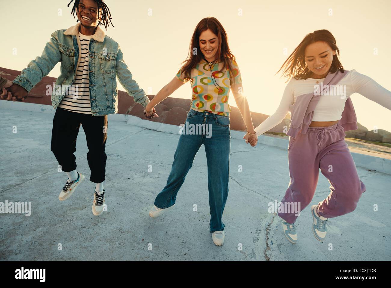 Group of friends enjoying the weather hi-res stock photography and ...
