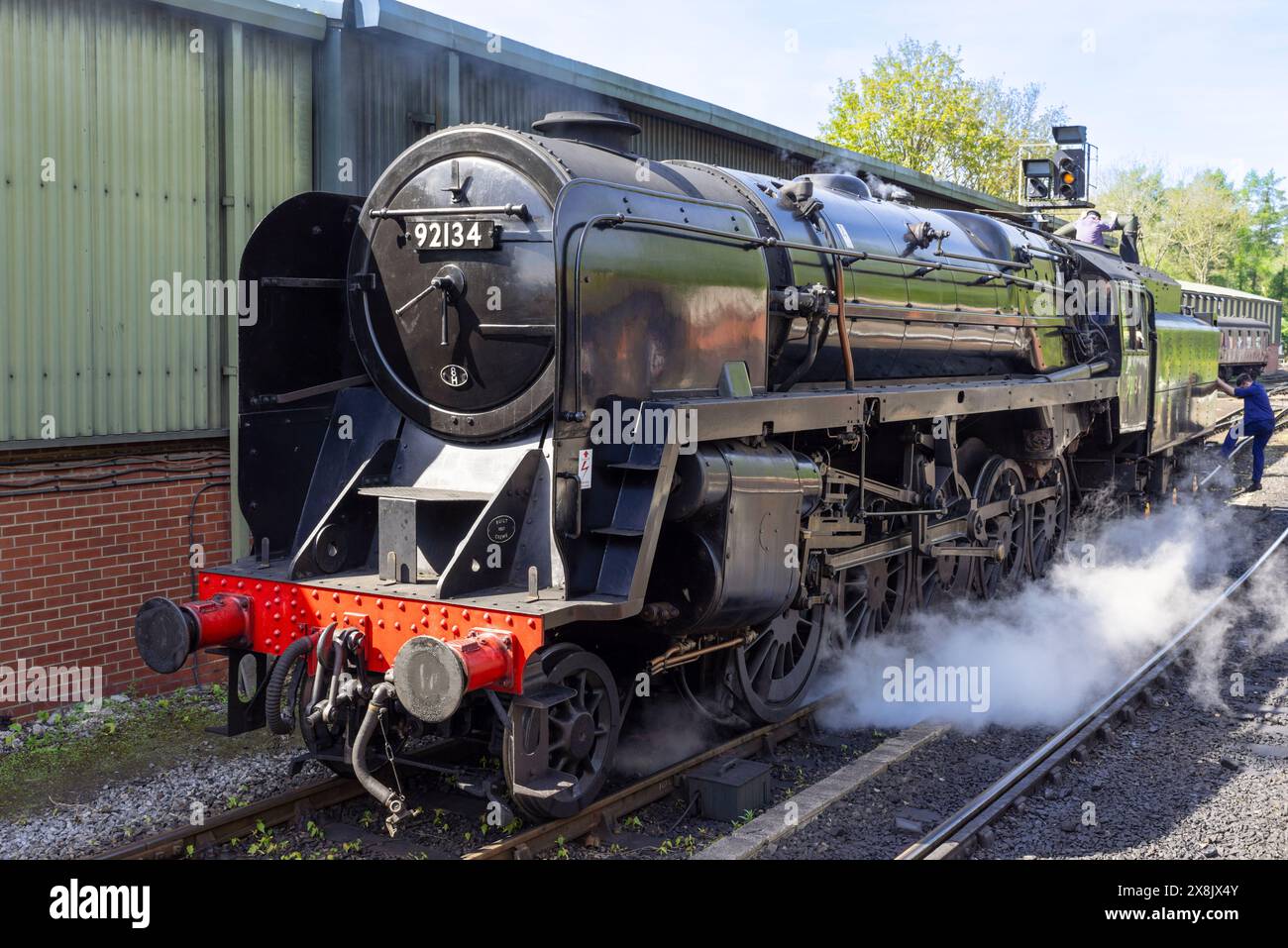 Steam train engine filling up with water at Pickering station at the ...