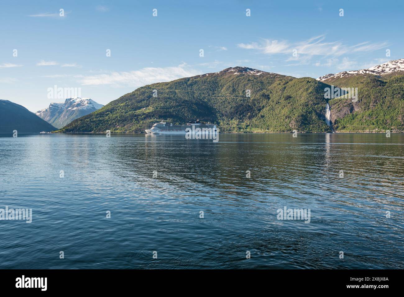 Enormous cruise ships dwarfed by the scale of the fjord, Norway Stock ...