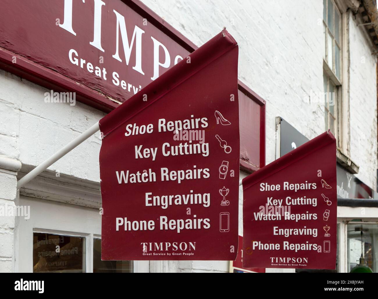Timpson shop with advertising banners for services offered, Totnes ...