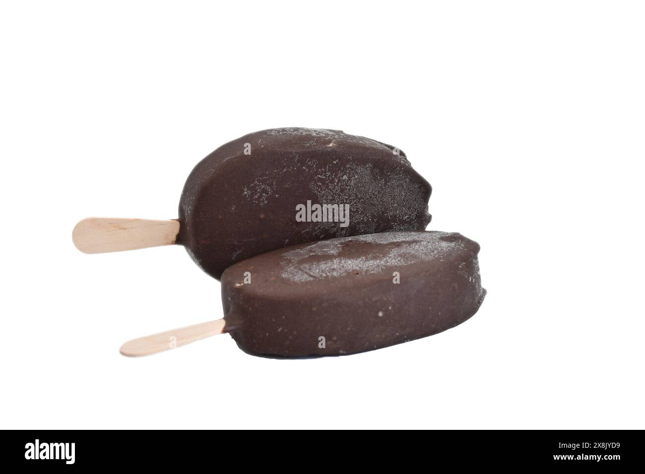 Two ice creams on sticks in chocolate glaze Stock Photo - Alamy