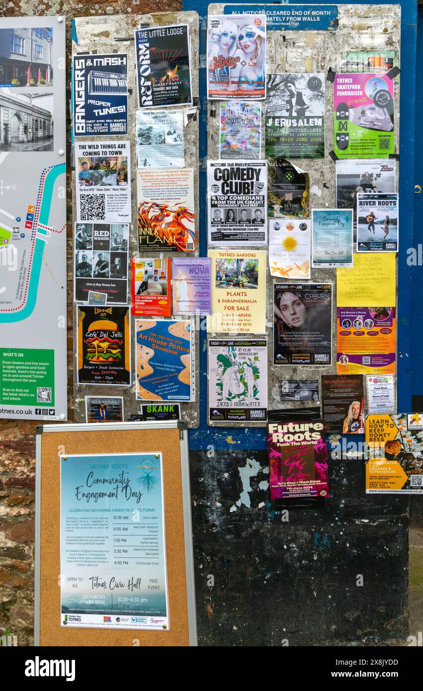 Posters and adverts for events on community noticeboard in town of ...