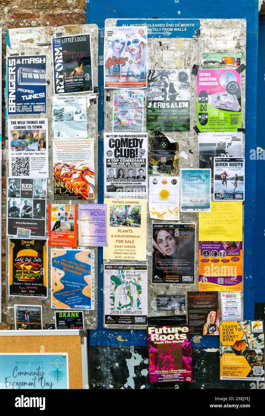 Posters and adverts for events on community noticeboard in town of ...