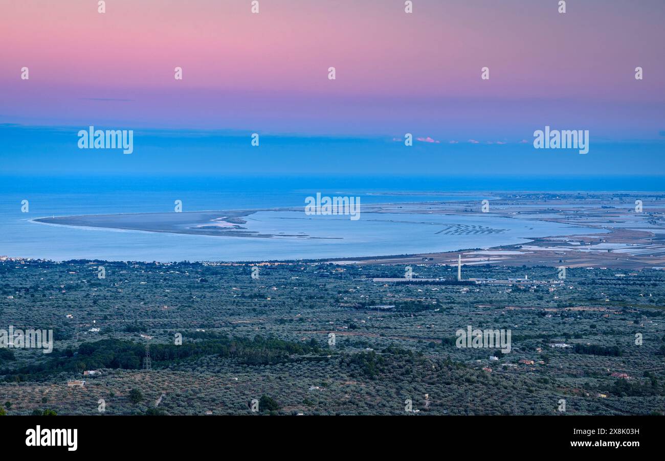 The Fangar bay and point seen from the Baix Ebre wind farm at sunset ...
