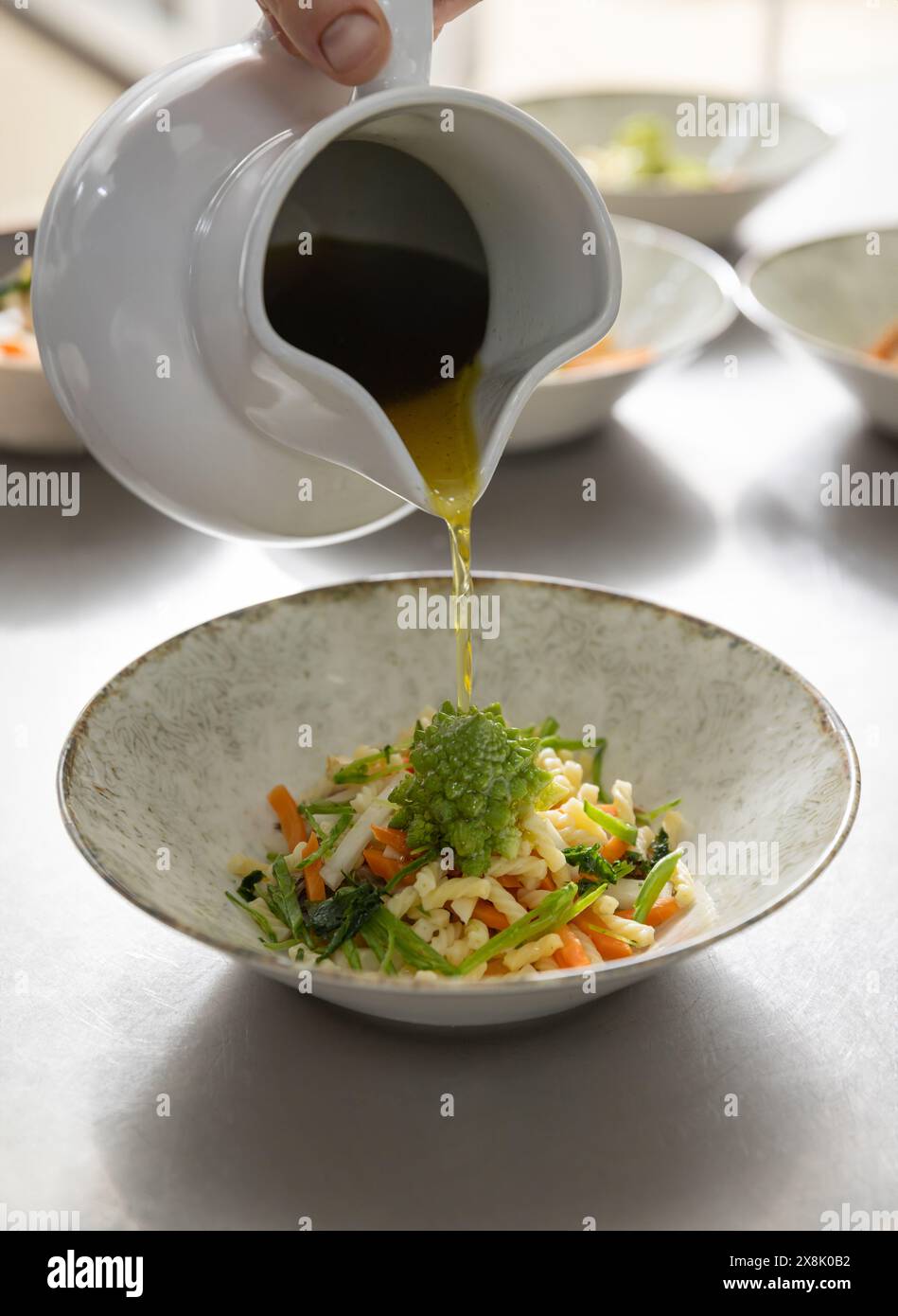 Pouring broth hi-res stock photography and images - Alamy