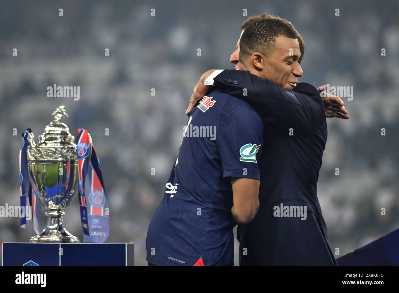 Paris Saint-Germain's forward Kylian Mbappe hugs French President ...