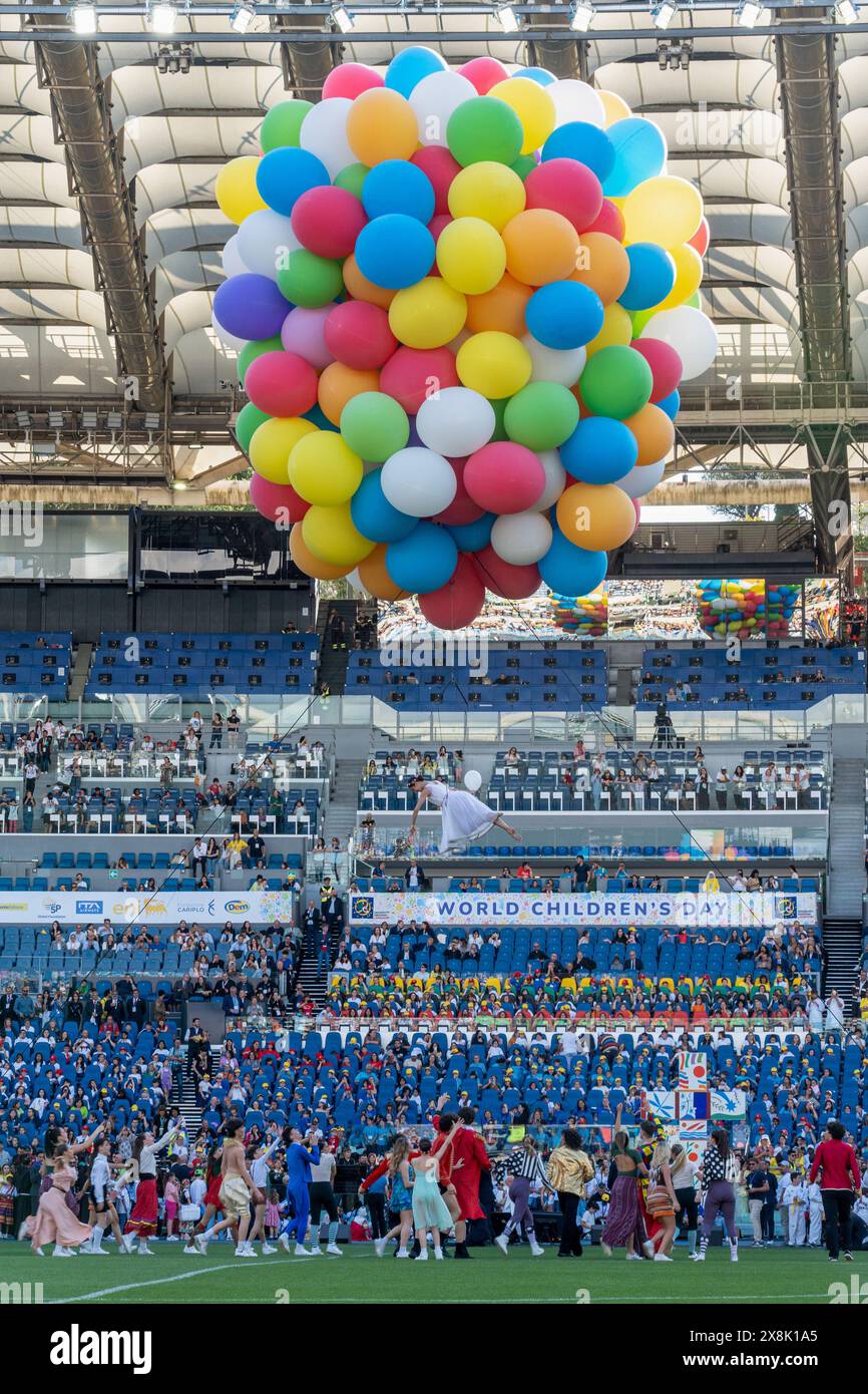 Rome, Italy. 25th May, 2024. A dancer seen performing with colorful ...