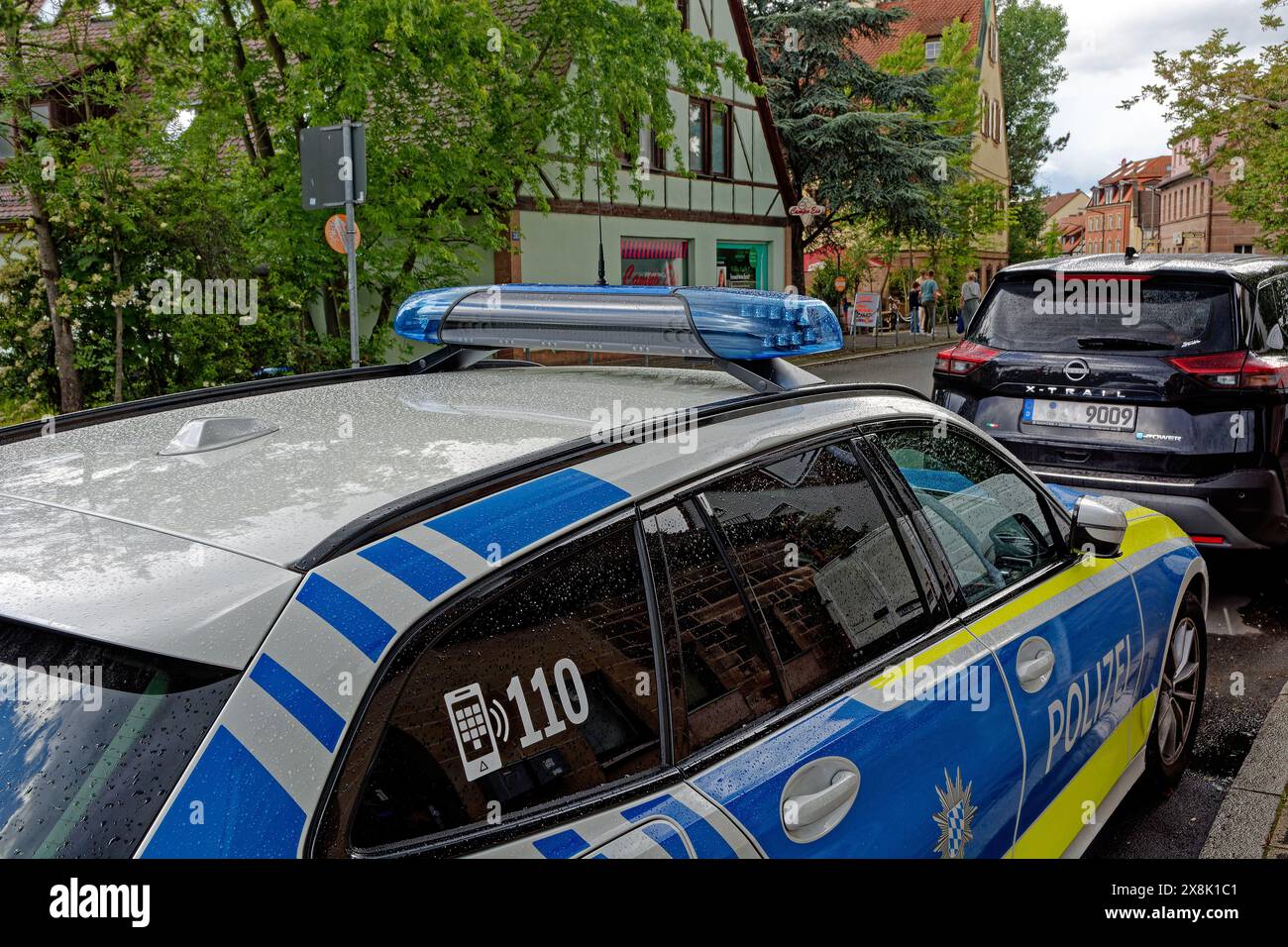 Blue lights on the roof of a police car Stock Photo - Alamy