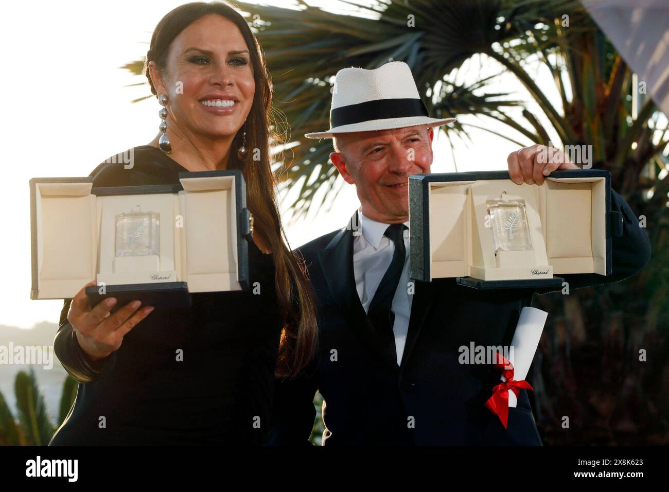 CANNES, FRANCE - MAY 25: Karla Sofía Gascón (L) poses with the 'Best ...