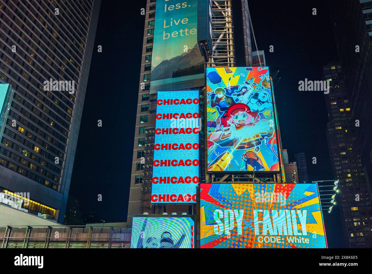 Nighttime view of Times Square with LED billboards on skyscraper ...