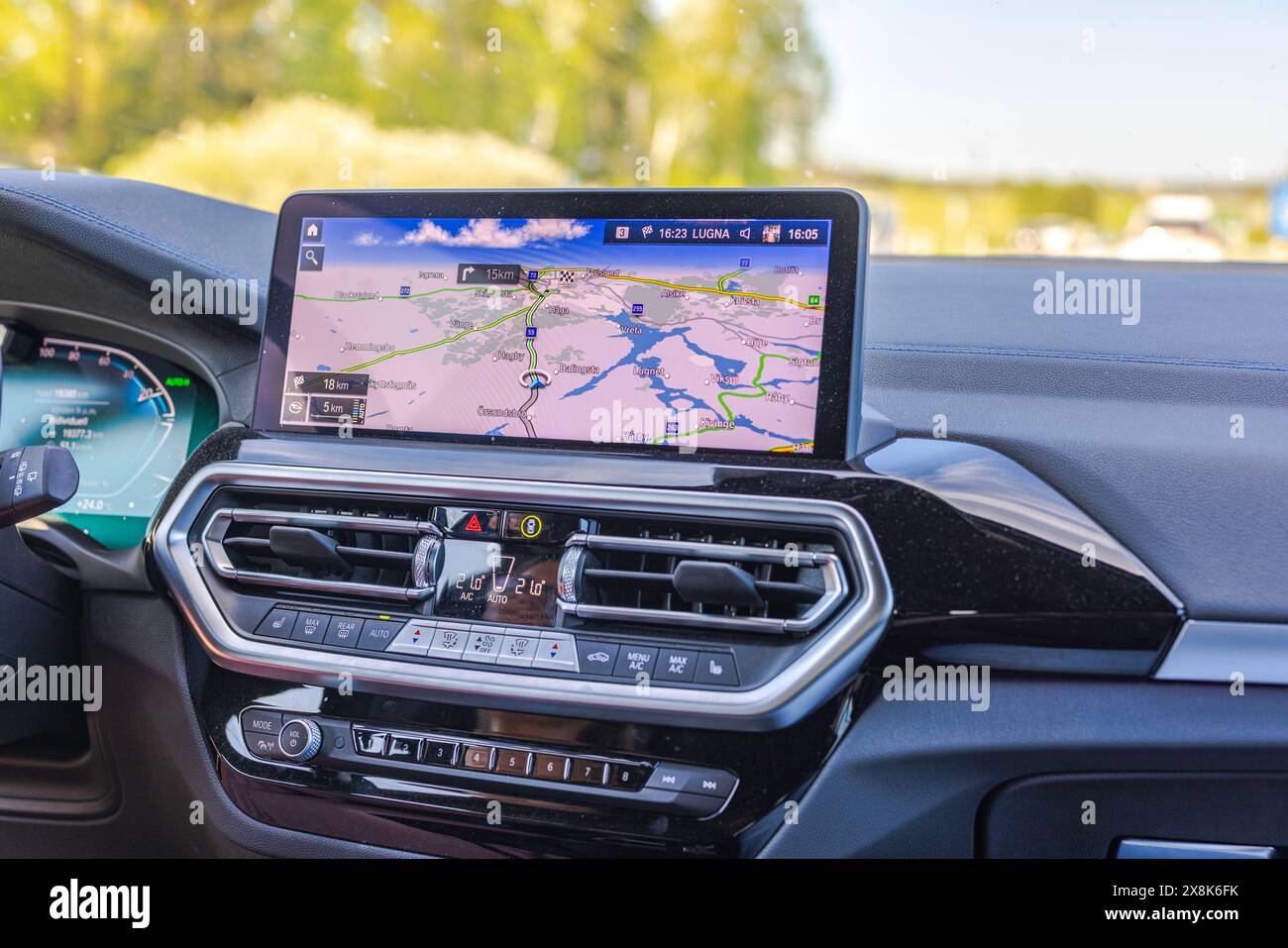 Close-up view of the navigation panel displaying the route of the BMW ...