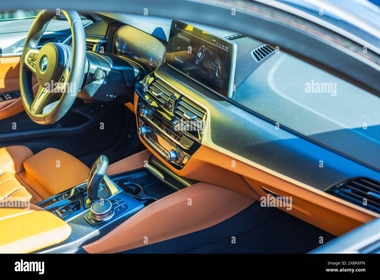 Close-up view from the passenger side of the interior of a BMW i4 ...