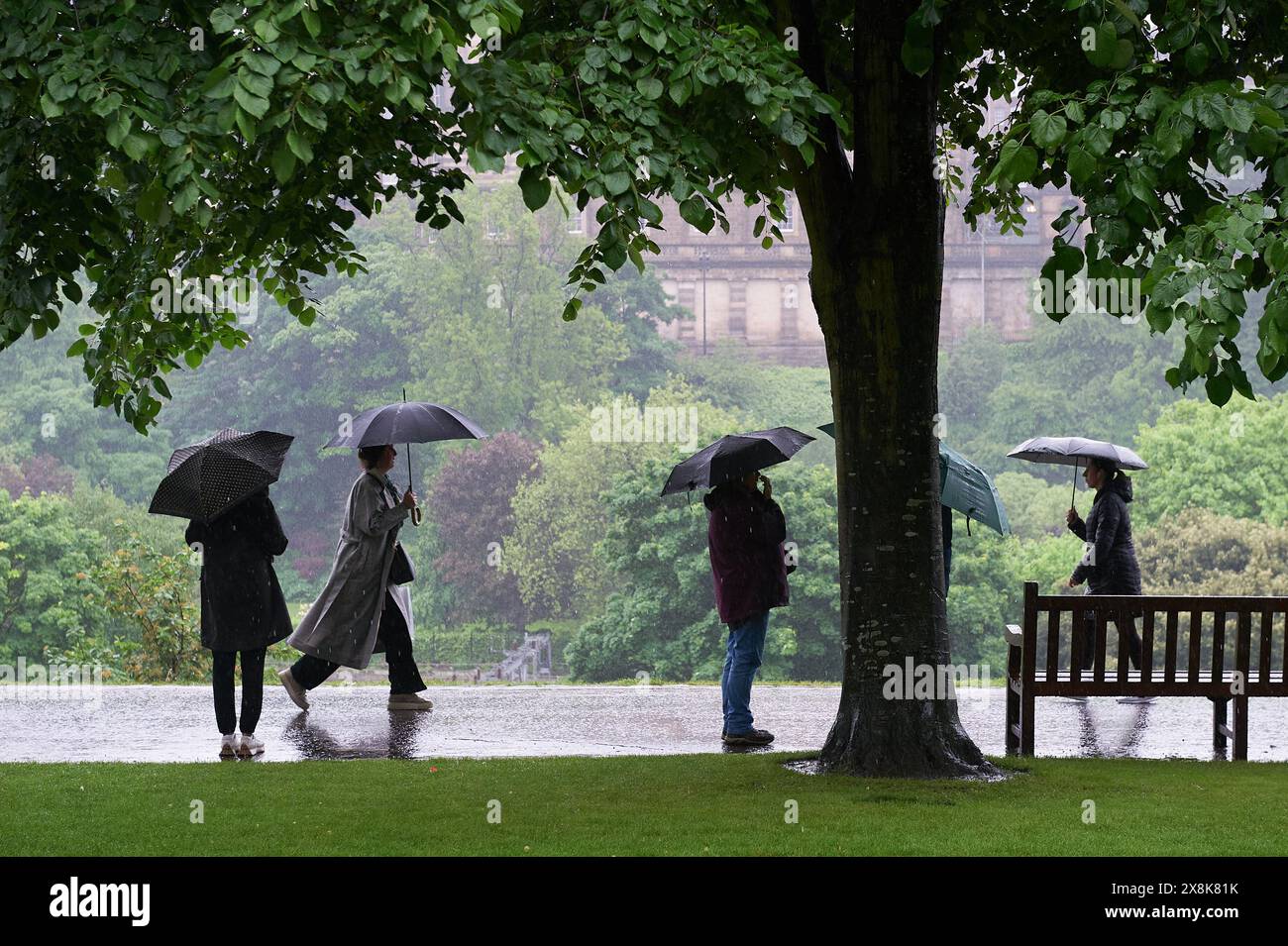 Edinburgh Scotland, UK 26 May 2024. WEATHER UK: People shelter from the ...