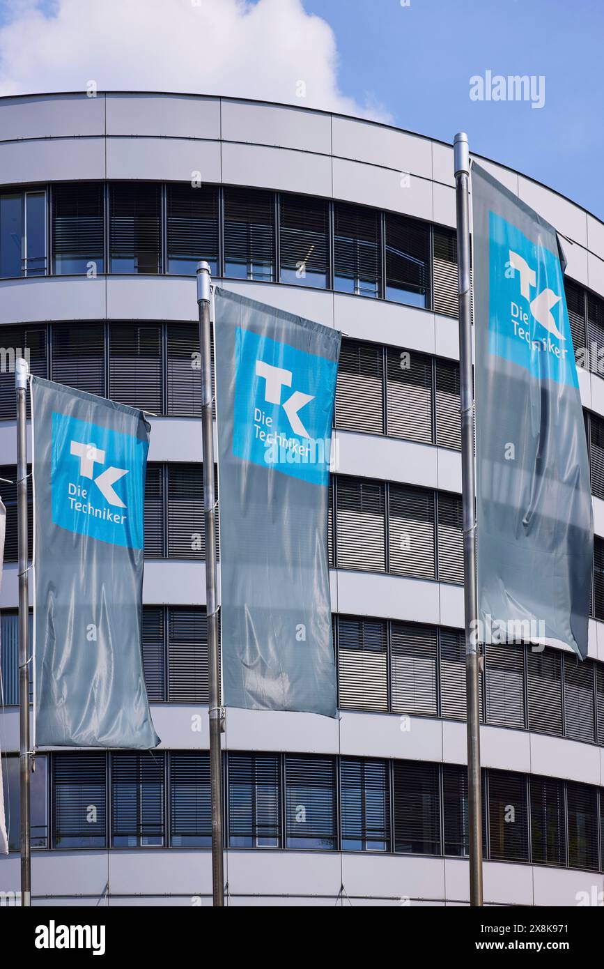 Flags of the health insurance company TK Die Techniker at the inner ...