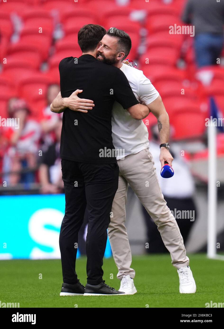 Southampton manager Russell Martin (left) greets David Prutton before ...