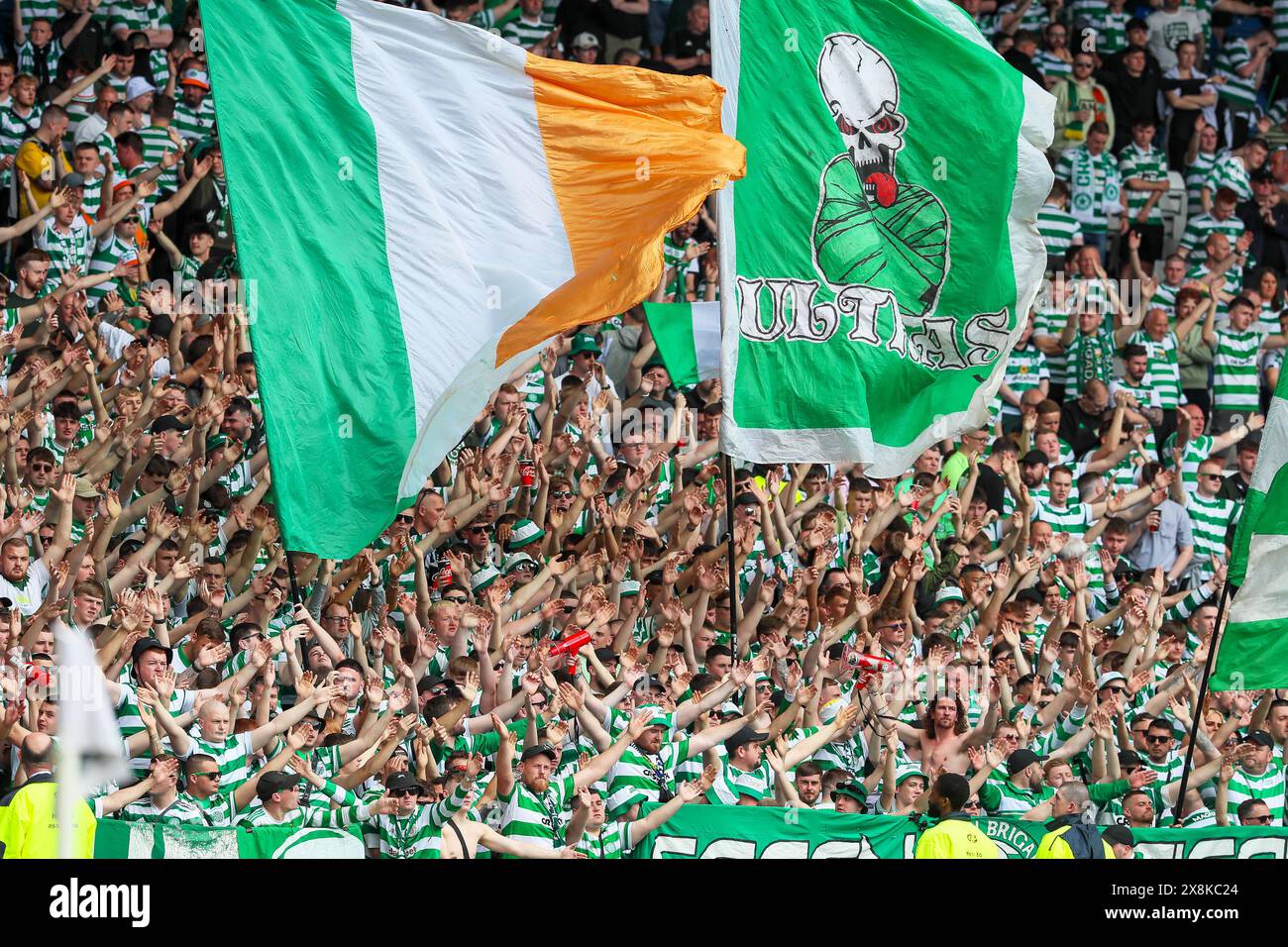 Celtic Football Club fans and supporters cheering on their team at Hampden Park, Glasgow ...