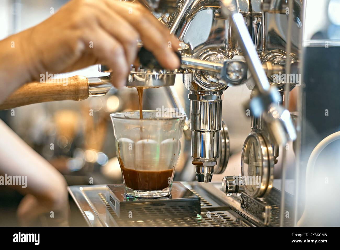 Close up barista making espresso coffee in cafe Stock Photo - Alamy
