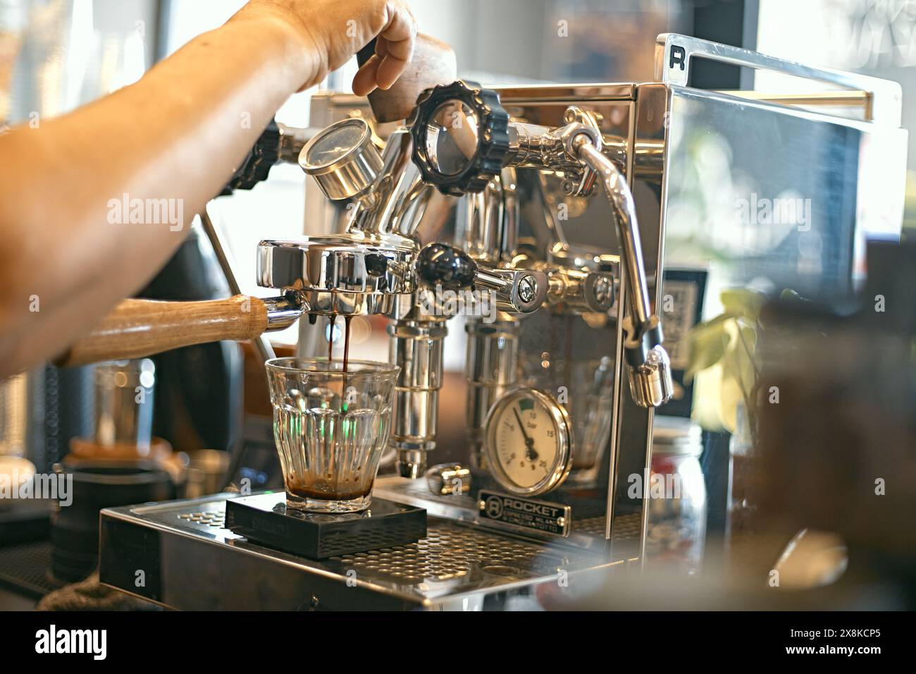 Close up barista making espresso coffee in cafe Stock Photo - Alamy